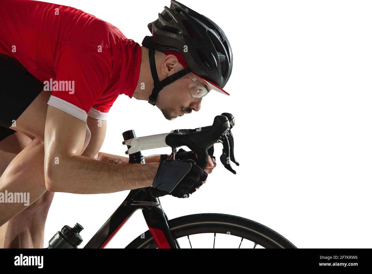 Close-up professional male cyclist on road bike isolated on white ...