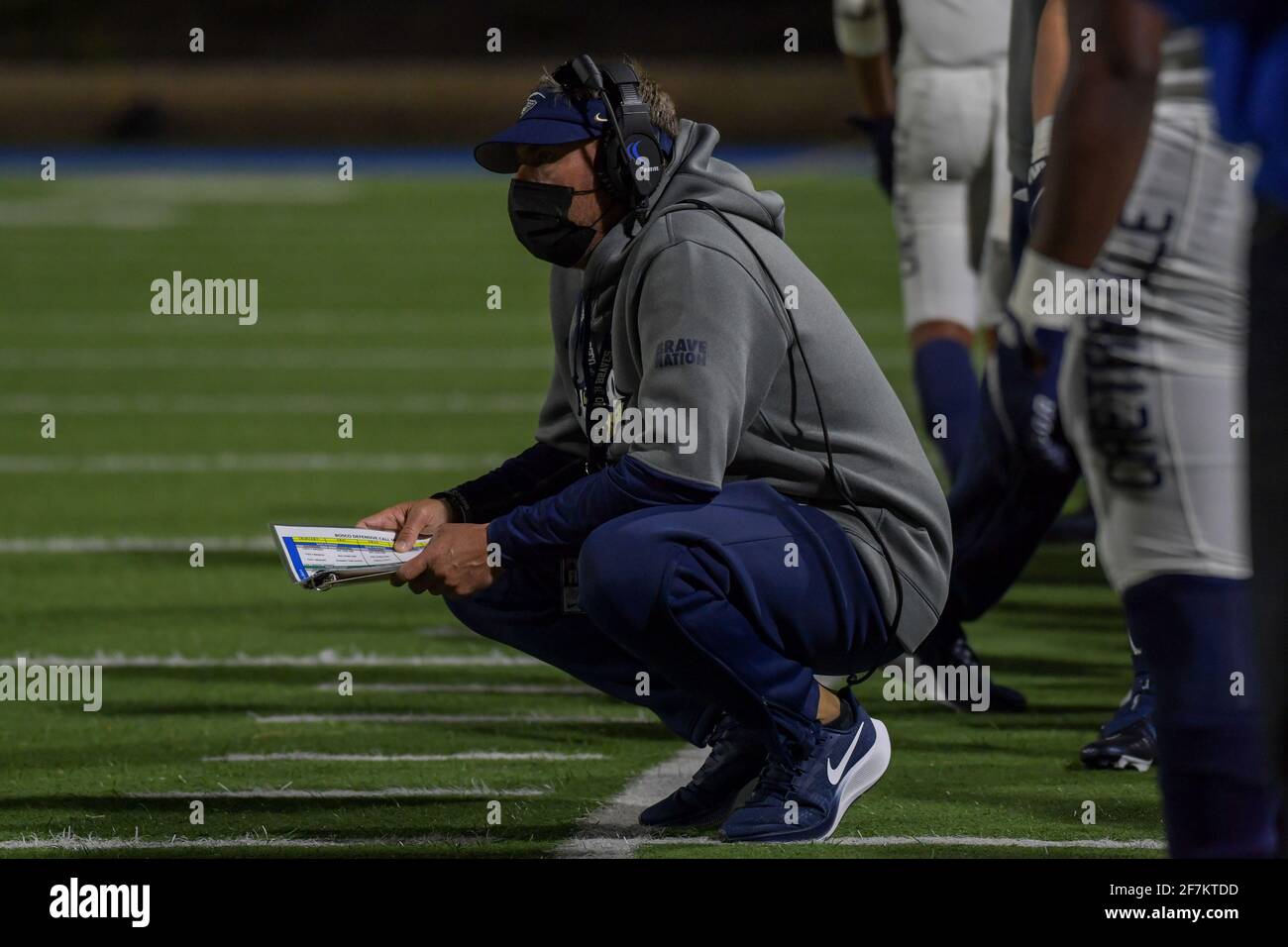 St. John Bosco Braves head coach Jason Negro observes during a high ...