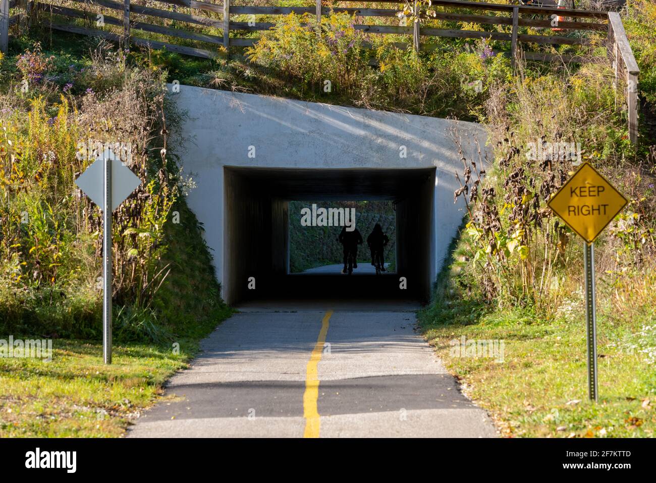 Cyclists Pass Through Tunnel on a Biking Path in Cuyahoga Valley ...