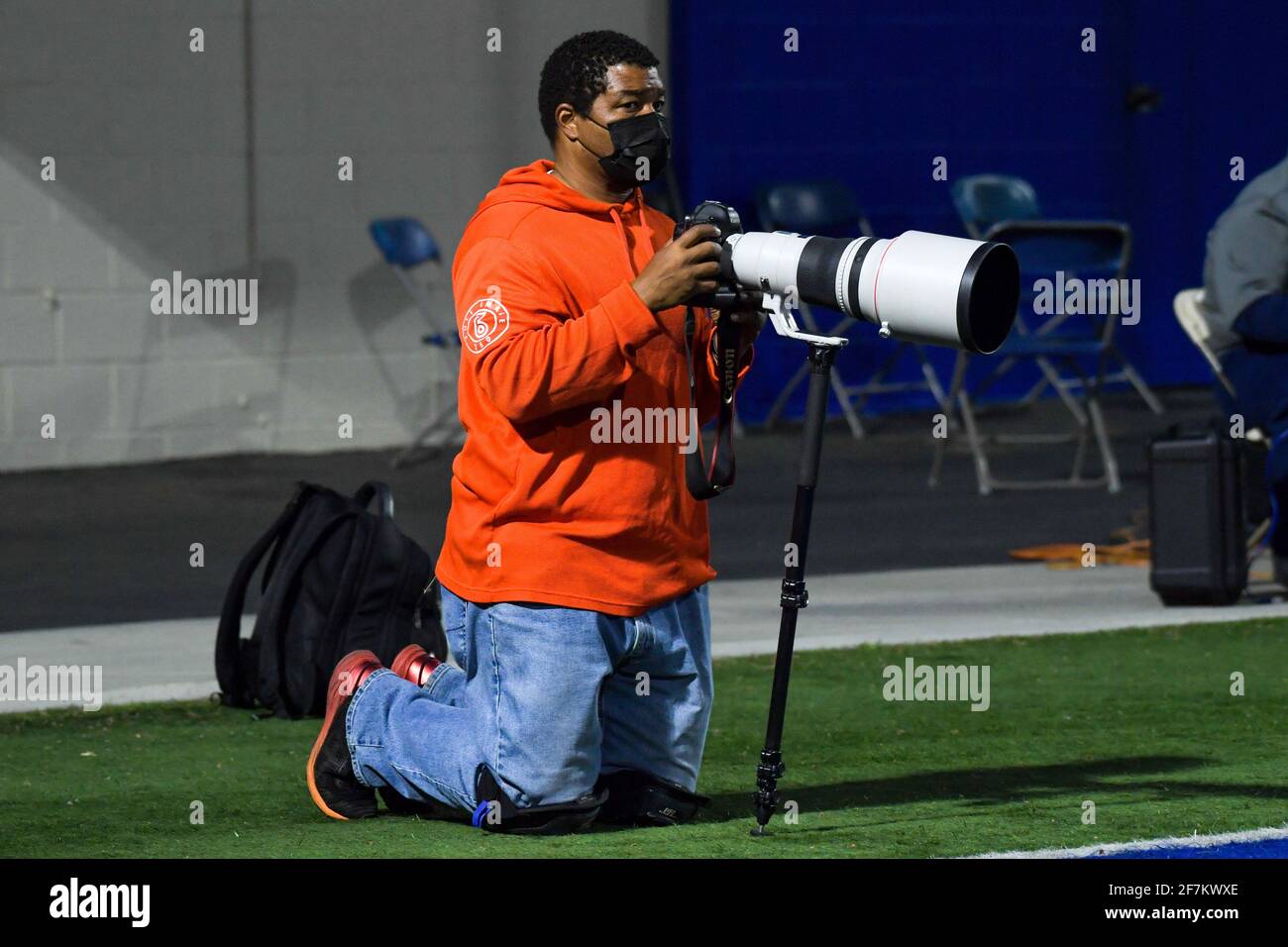 Full Image 360 photographer Jevone Moore works during a high school ...