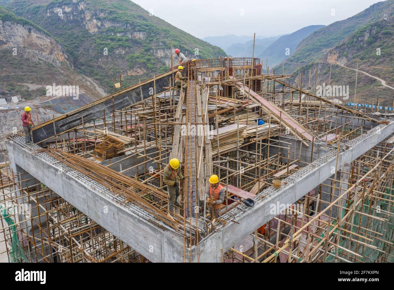 BIJIE, CHINA - APRIL 8, 2021 - Workers work on the spillway tunnel of ...