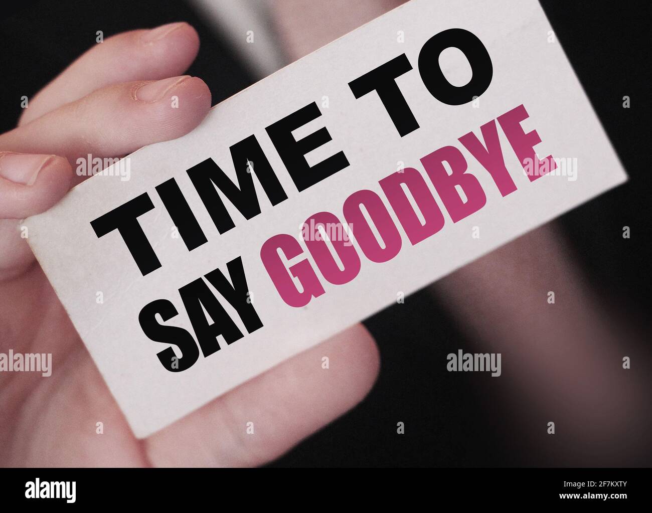 Time to Say Goodbye words on a card in hand of businessman. Business ...