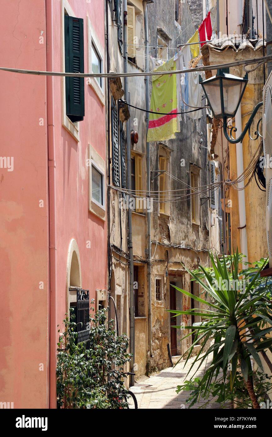 Corfu Old Town: one of the narrow, winding backstreets with washing ...