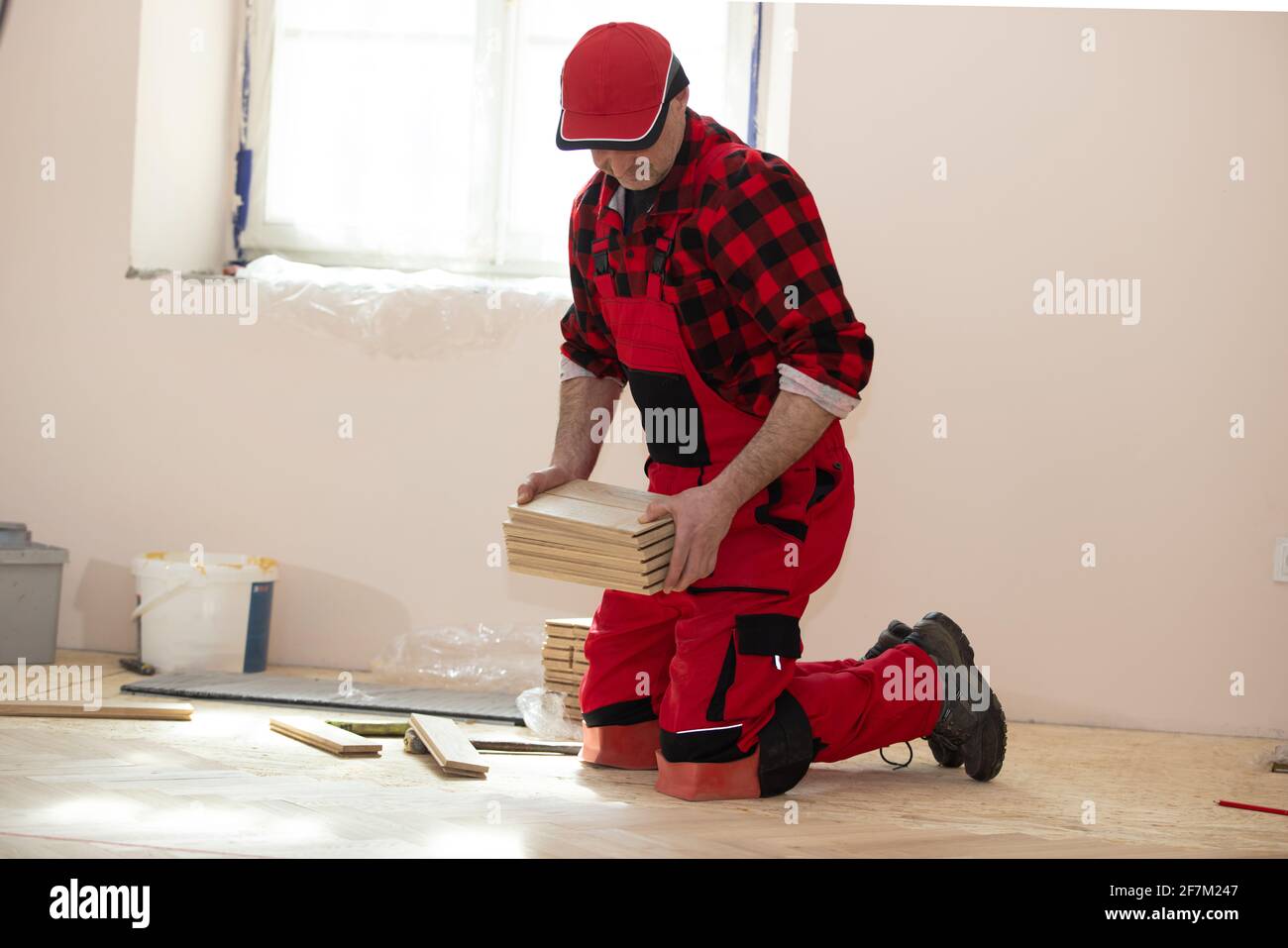 Carpenter installing wooden flooring hi-res stock photography and ...