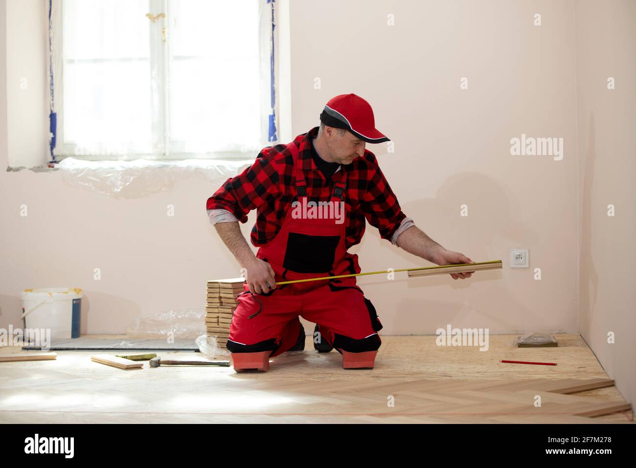 Floor Man Measuring Room High Resolution Stock Photography and Images ...