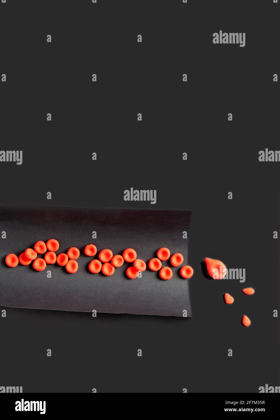 World hemophilia day concept. Red blood cells and blood drops are made ...