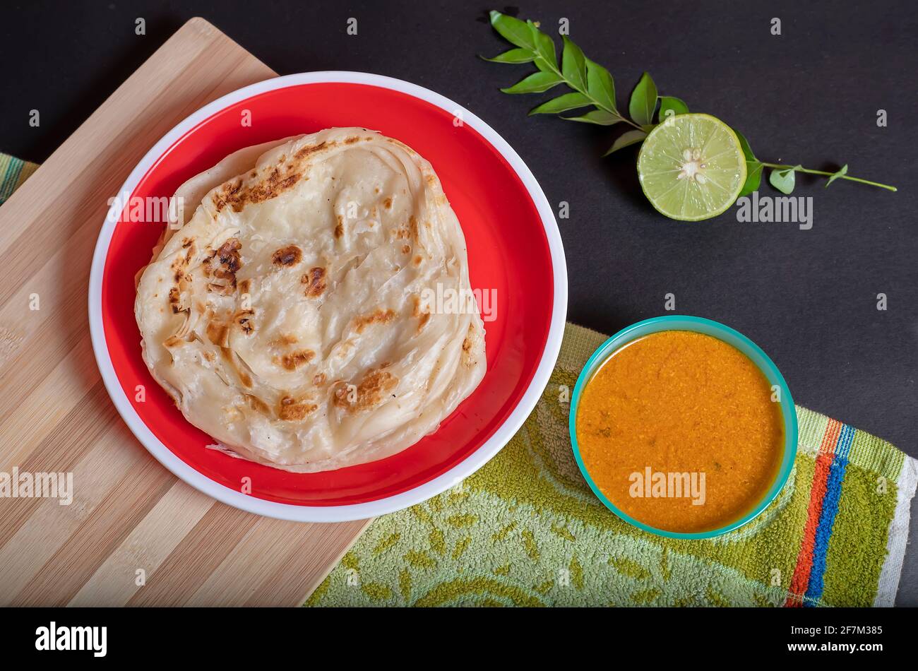 Kerala parotta with chicken gravy in a South Indian dish Stock Photo ...