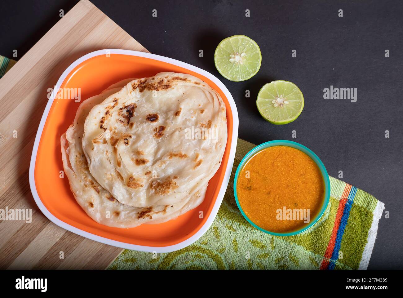Porotta and chicken curry hi-res stock photography and images - Alamy