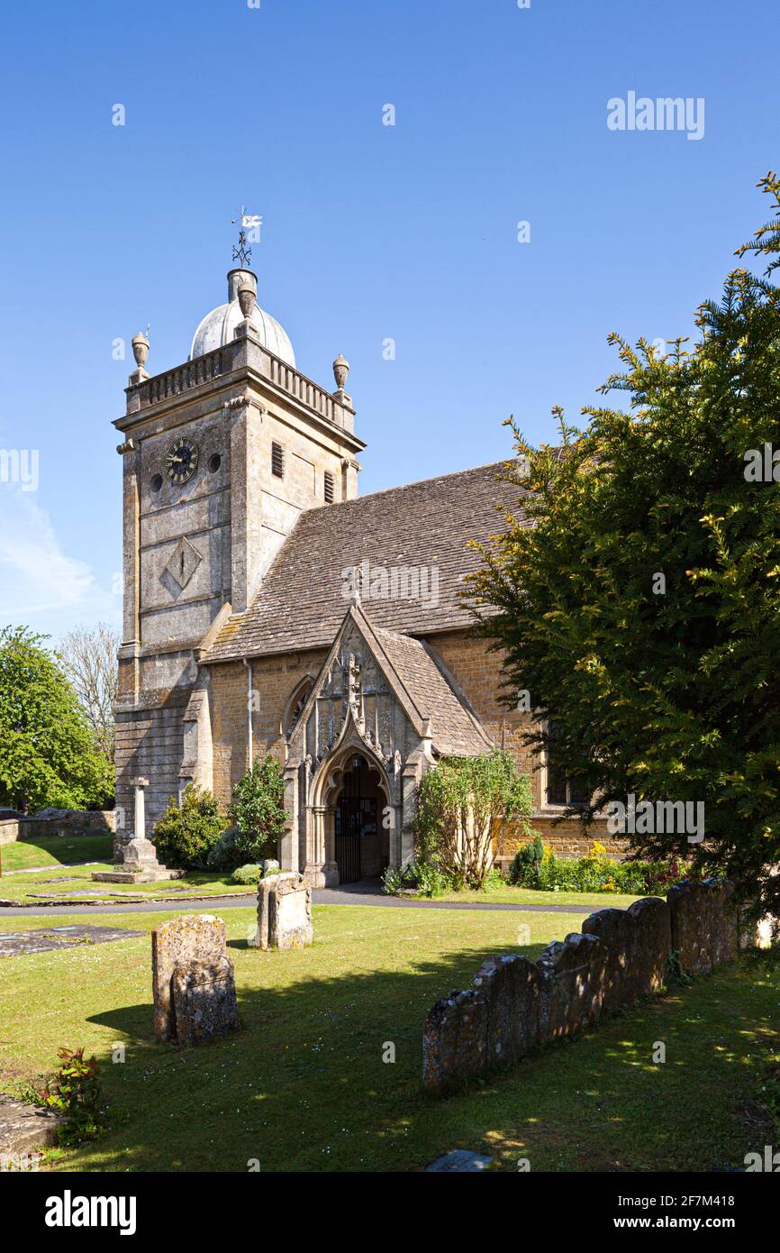 The church of St Lawrence in the Cotswold village of Bourton on the ...