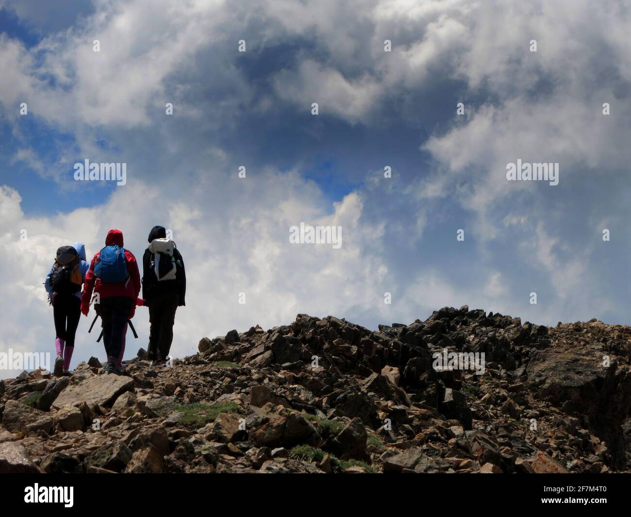 Group of people climbing mountain high altitute treking climb hike ...