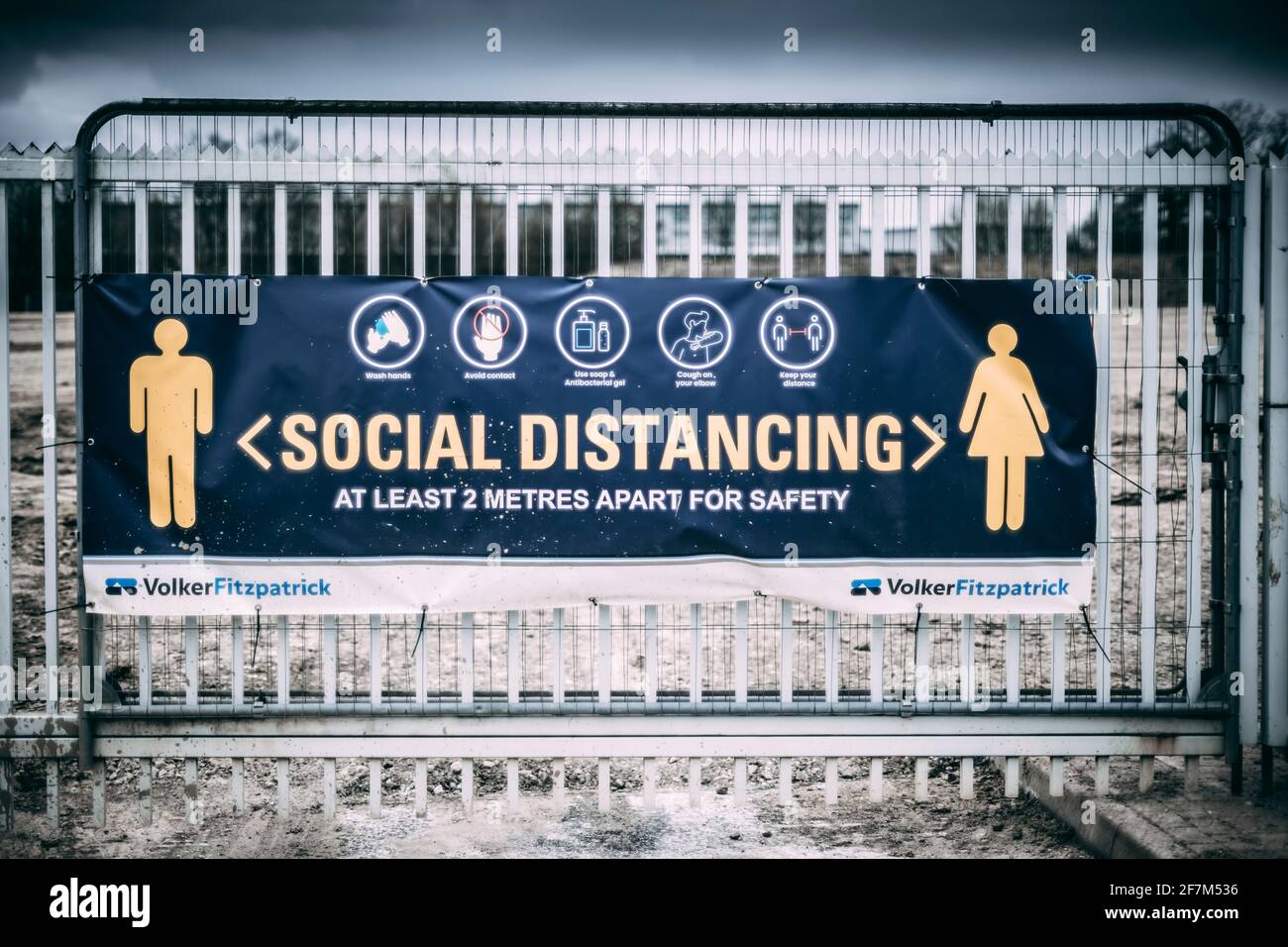 Social Distancing warning sign, Building site, Harlow, essex, uK Stock ...