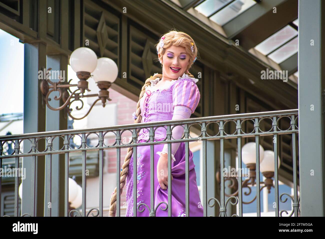 Orlando, Florida. August 04, 2020. Rapunzel waving from the balcony at ...