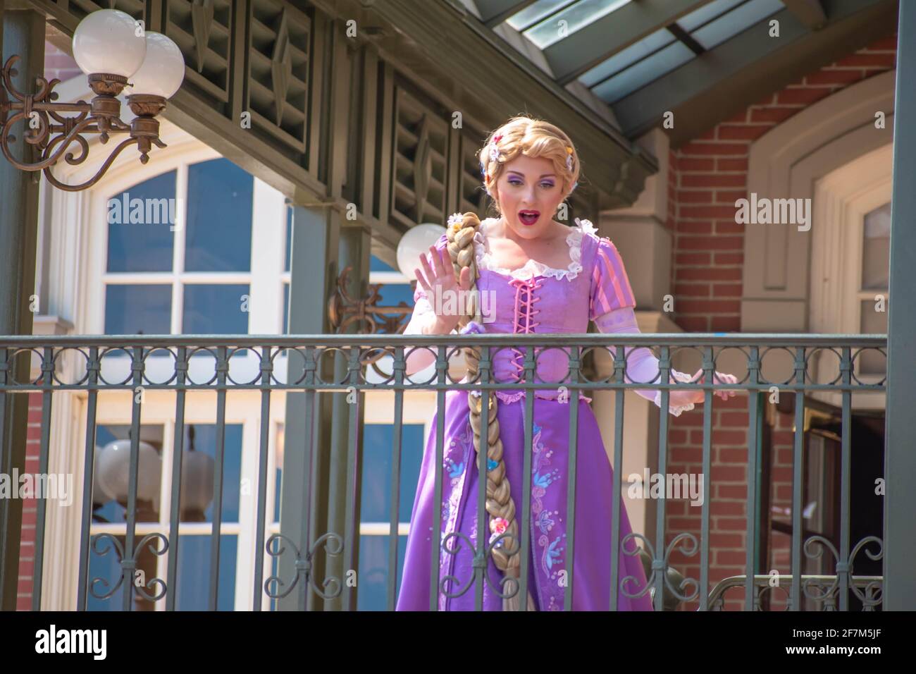 Orlando, Florida. August 04, 2020. Rapunzel waving from the balcony at ...