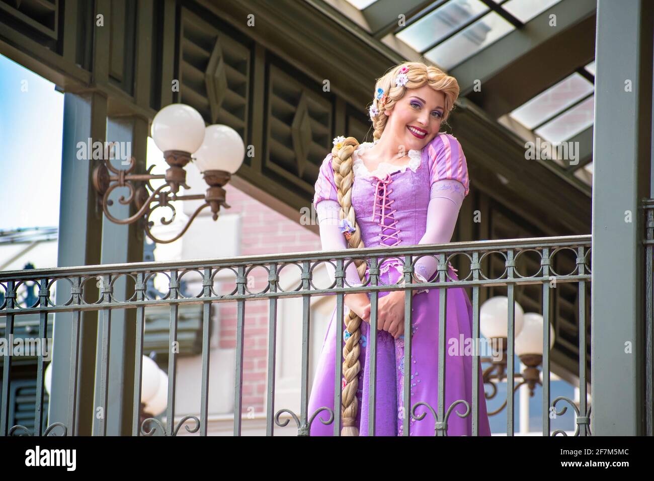 Orlando, Florida. August 04, 2020. Rapunzel waving from the balcony at ...