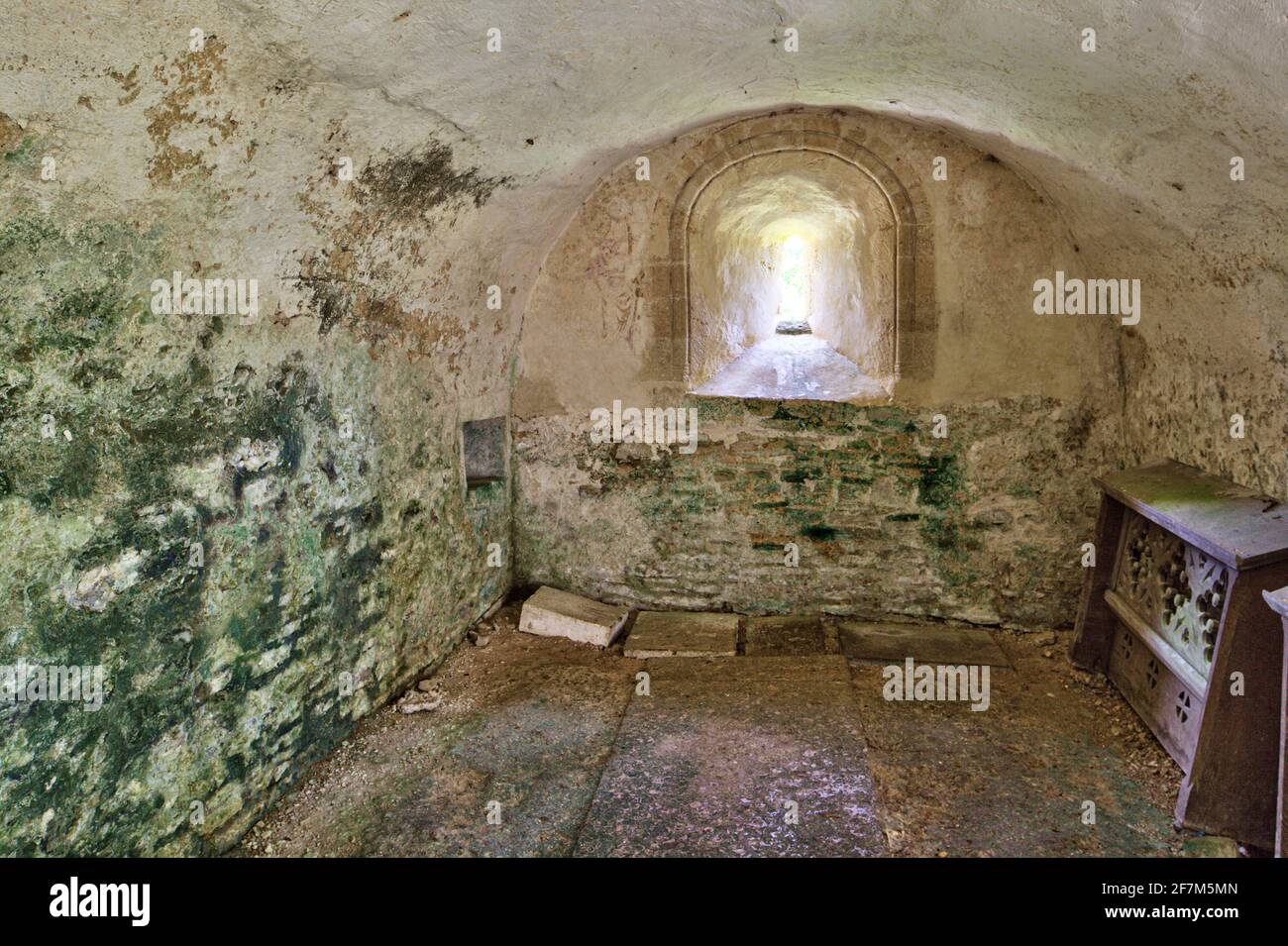 The Norman barrel-vault crypt with traces of wall paintings beneath St ...