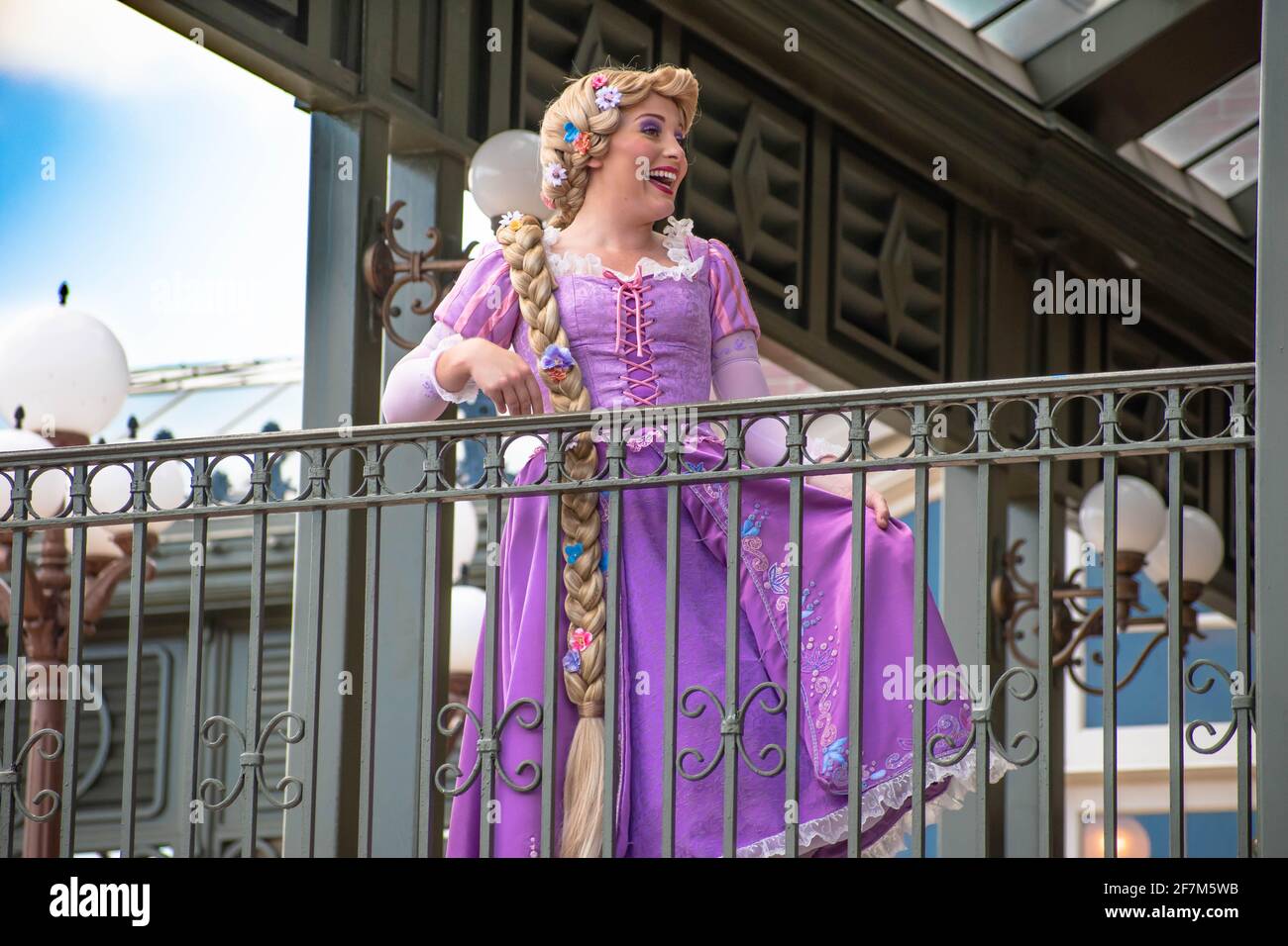 Orlando, Florida. August 04, 2020. Rapunzel waving from the balcony at ...