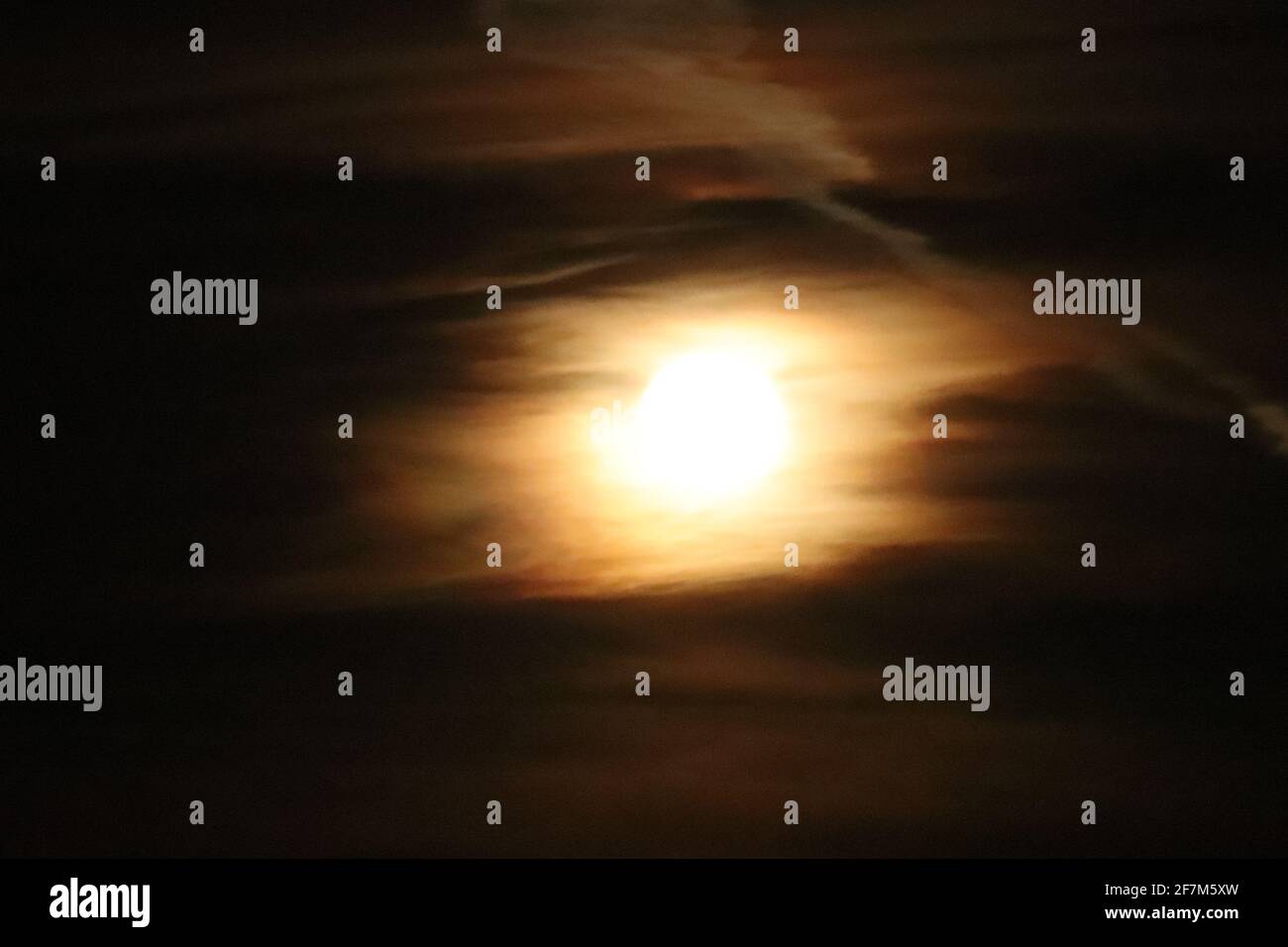 Full moon behind moving cloud hi-res stock photography and images - Alamy