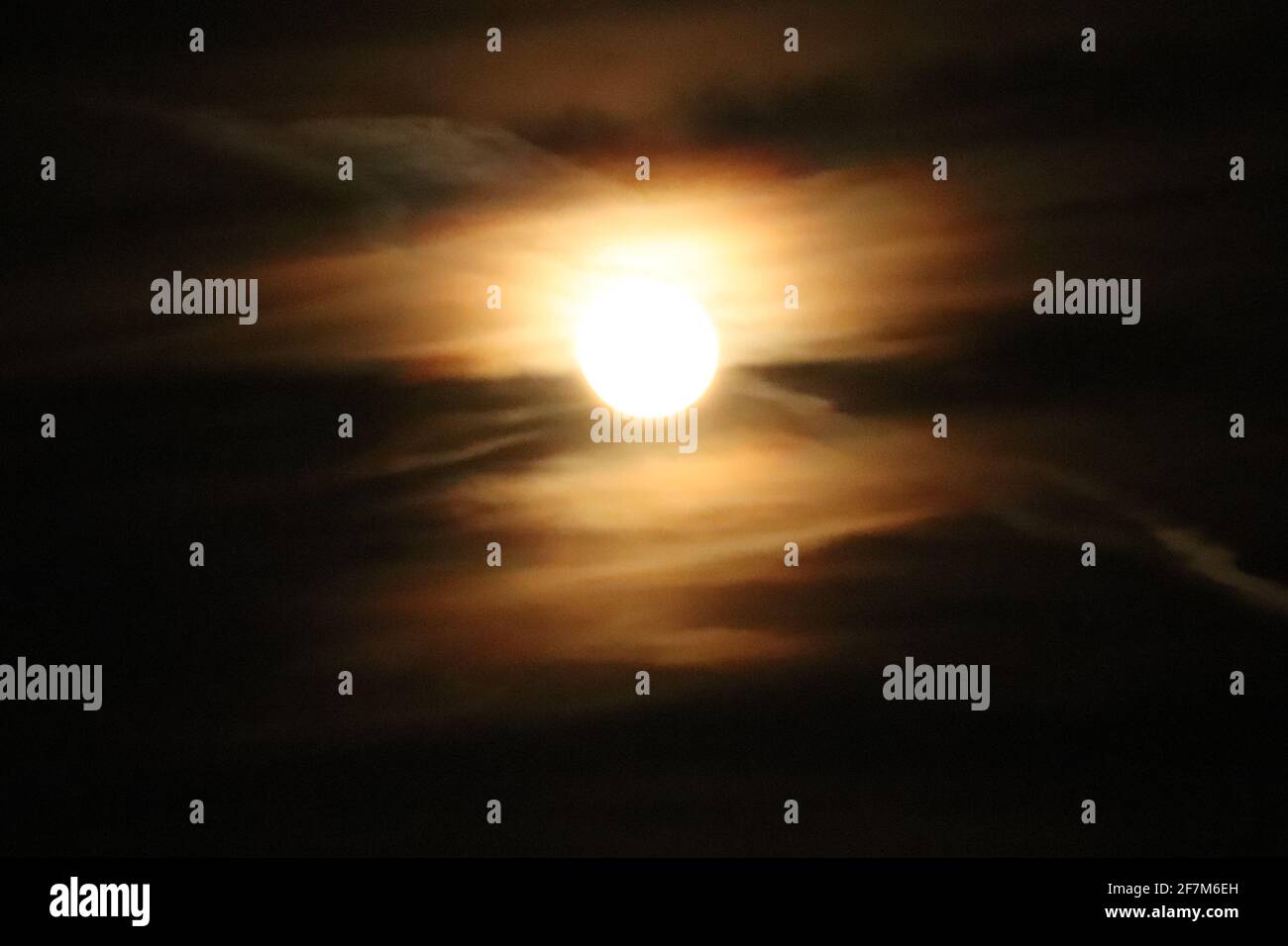 Full moon behind moving cloud hi-res stock photography and images - Alamy