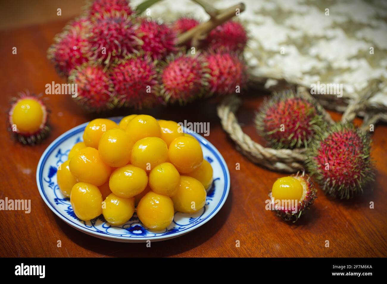 Wild Rambutan with yellow flesh Stock Photo - Alamy