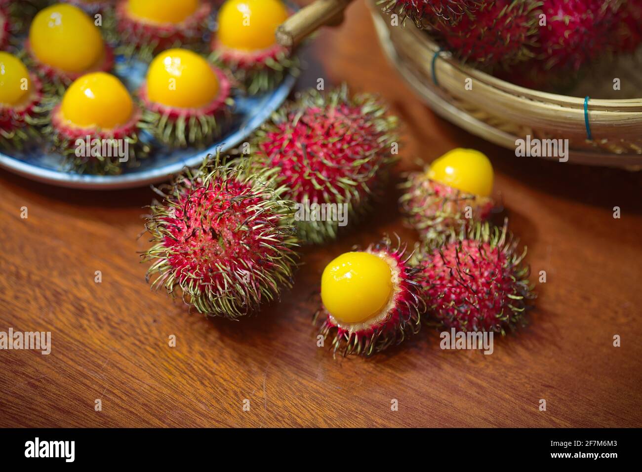 Wild Rambutan with yellow flesh Stock Photo - Alamy