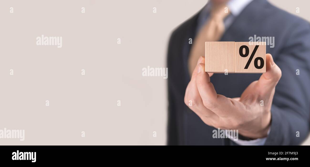 Mockup percent. Businessman holding percent sign in hand. Business man ...