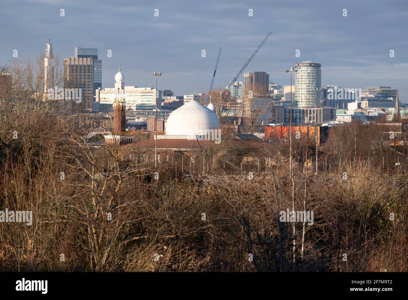 View looking down across overgrown and disused waste ground from ...