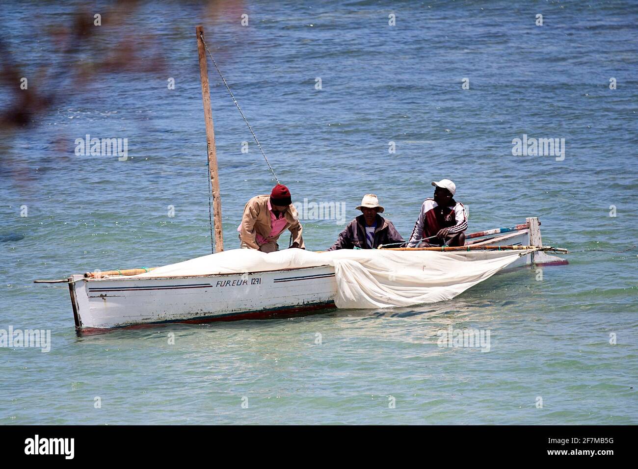 Fishermen turning from daily catch with traditional sailing boat ...
