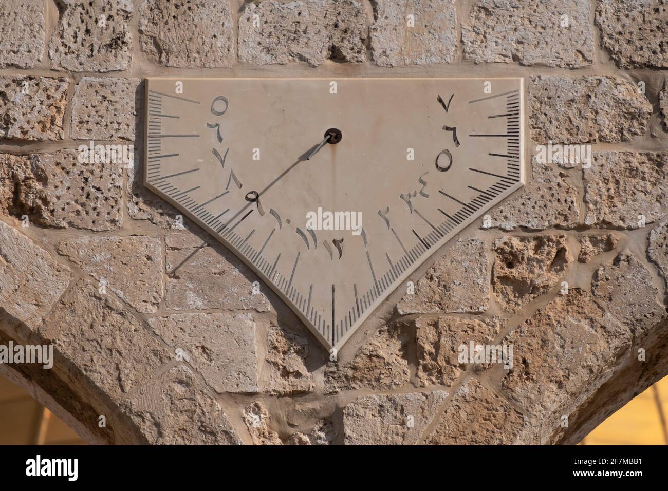 A sundial, built at the beginning of the 20th century. with Arabic ...