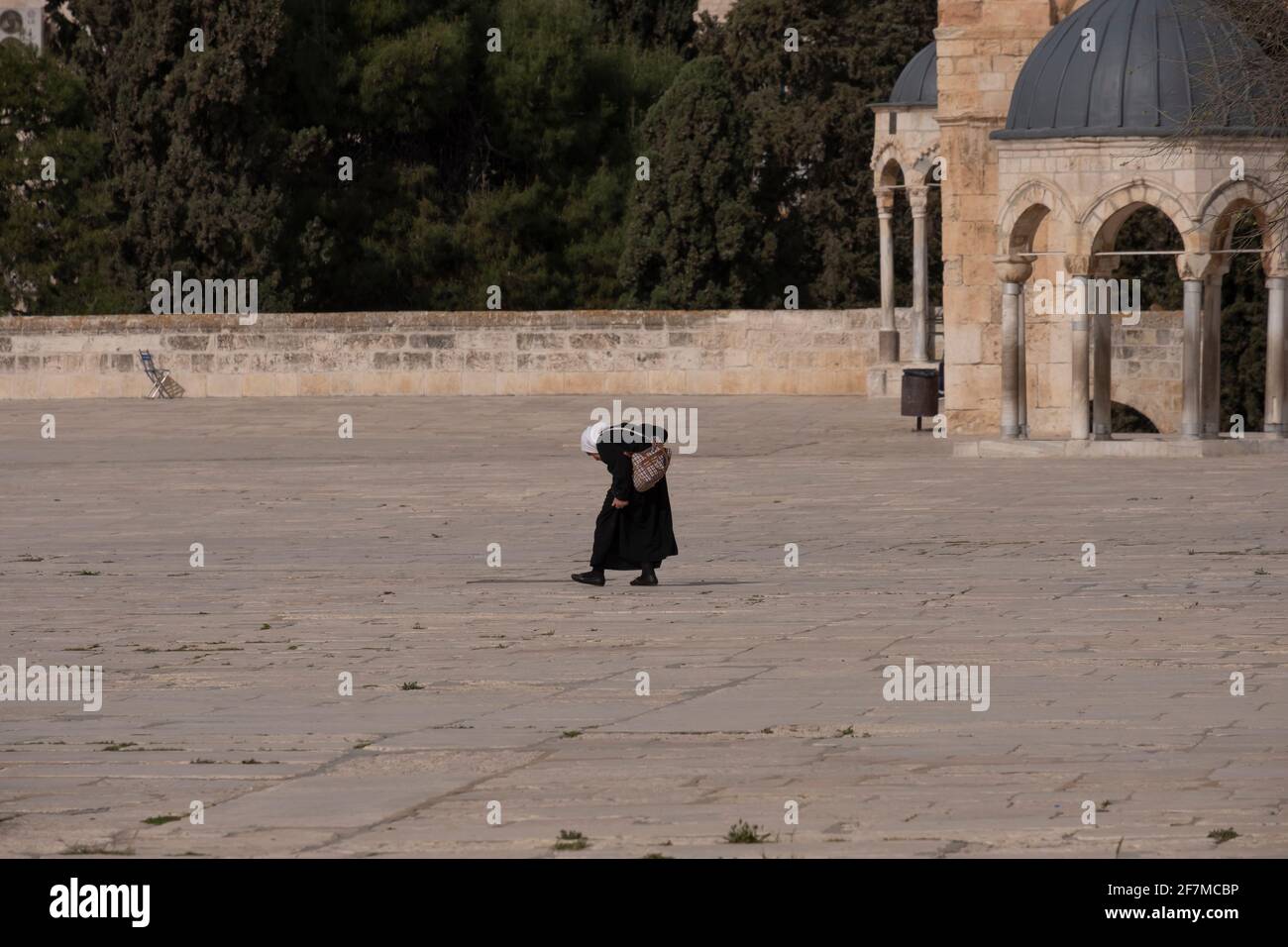 An elderly Palestinian woman visiting the Temple Mount known to Muslims ...