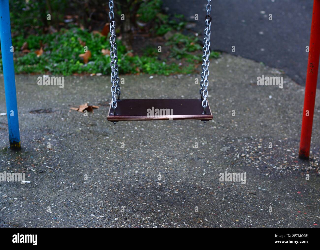 Swing in a playground summer a swing hanging seat hi-res stock ...