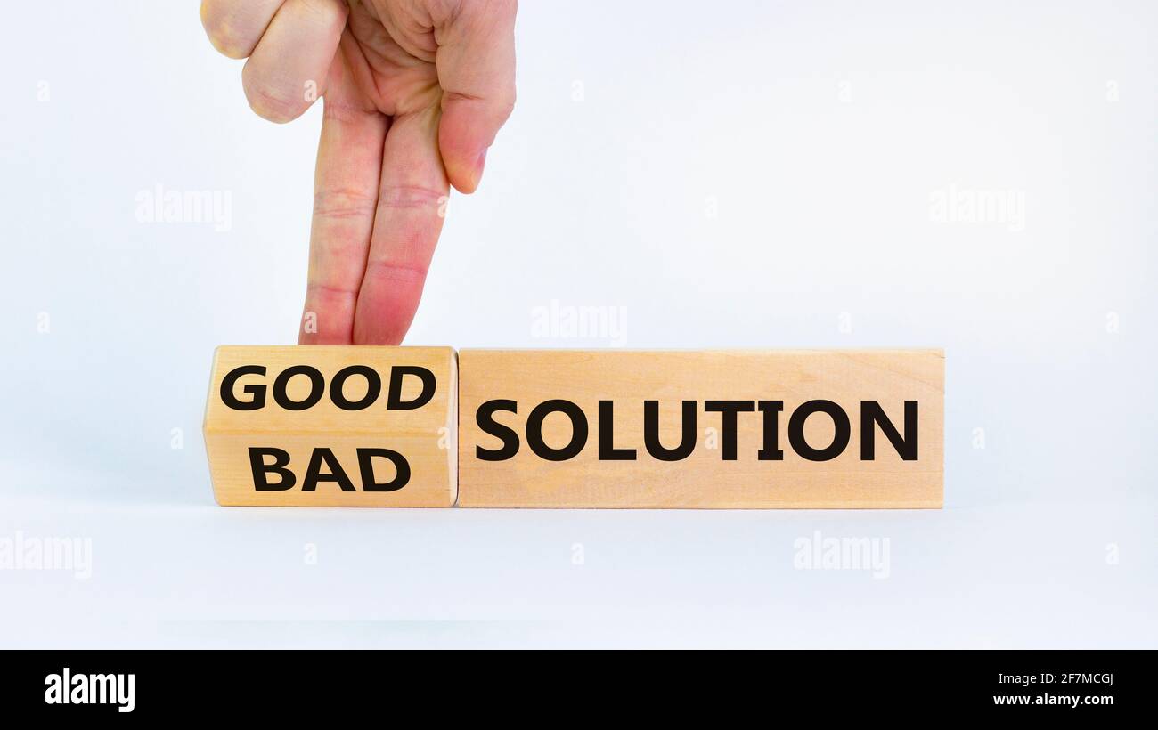 Good or bad solution concept. Businessman turns a block and changes ...