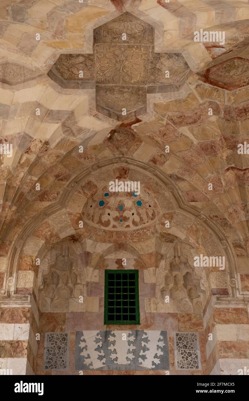 Mamluk-style ornament at the entrance of the Madrasa Al-Ashrafiyya an ...
