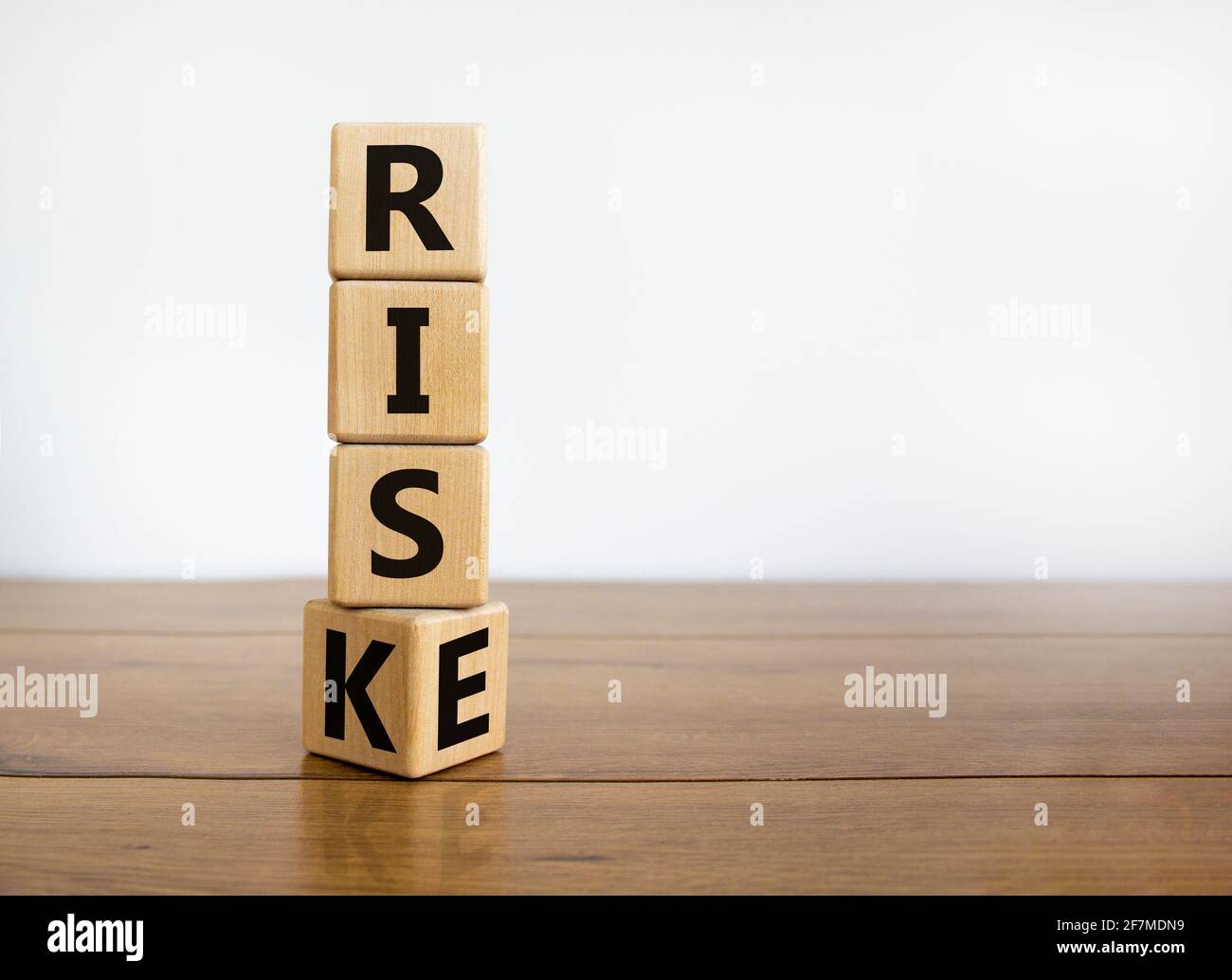 Risk vs rise symbol. Turned a wooden cube and changed the word risk to ...