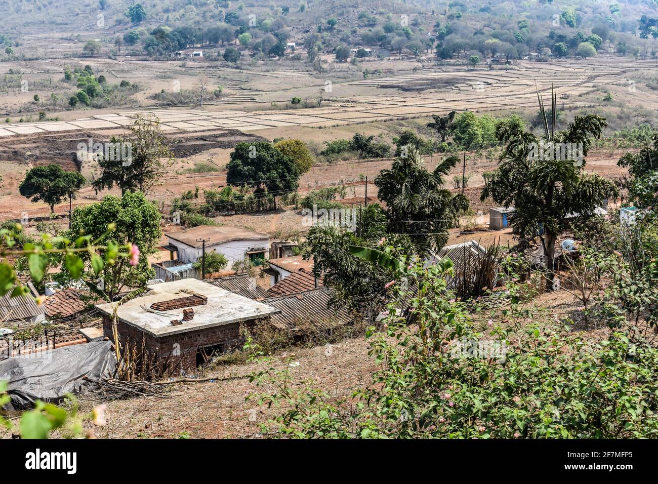 small village colony top view from the mountain above with greenery ...