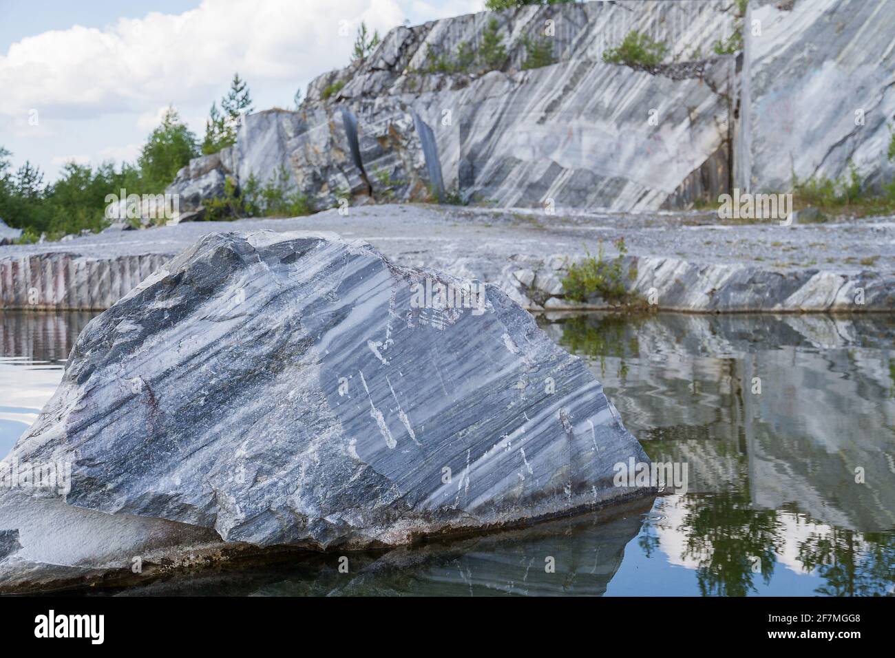 Natural marble stone texture in an old quarry Stock Photo - Alamy