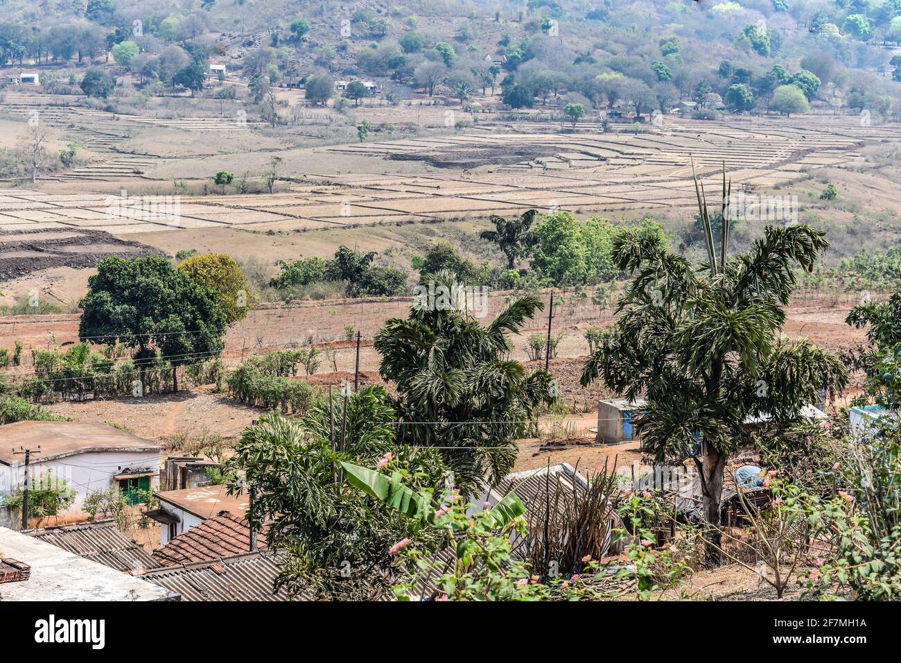 small village colony top view from the mountain above with greenery ...