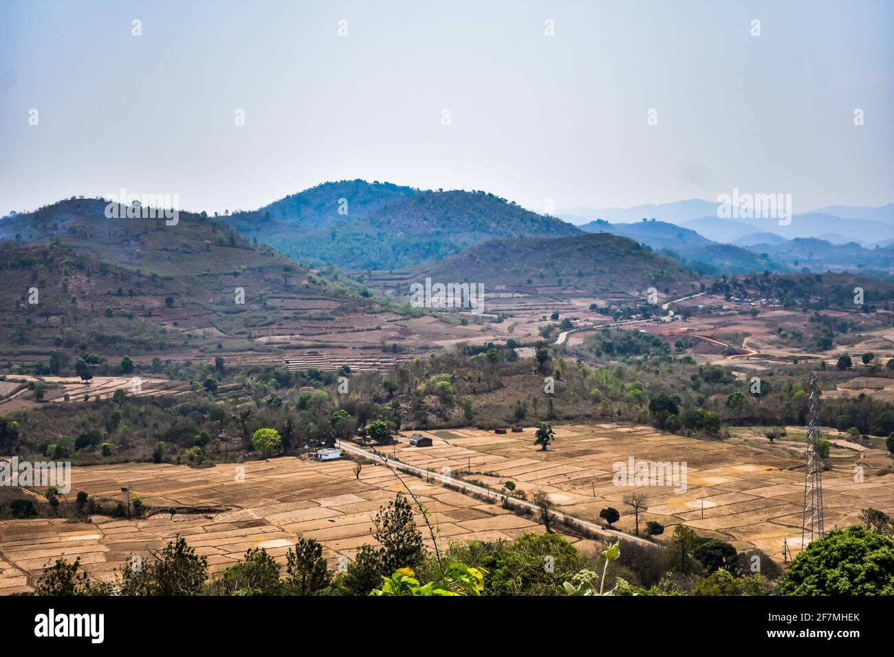 small village colony top view from the mountain above with greenery ...