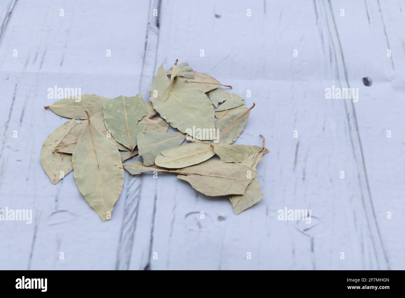 Dried bay leaves - the benefits of bay leaves concept Stock Photo - Alamy