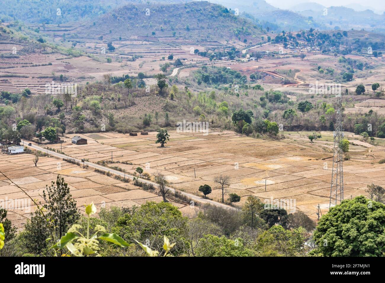small village colony top view from the mountain above with greenery ...