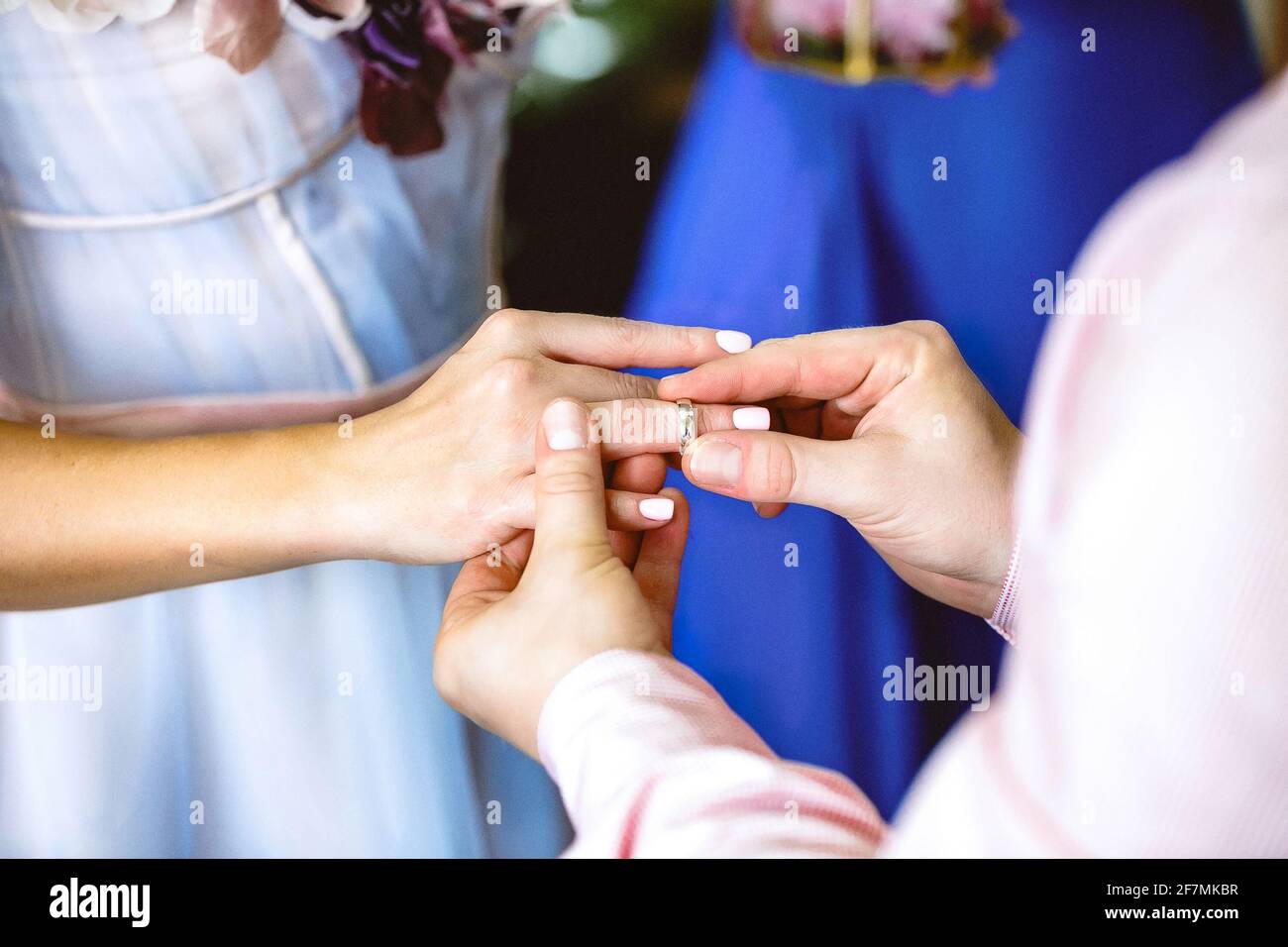 Wearing wedding ring on finger hi-res stock photography and images - Alamy