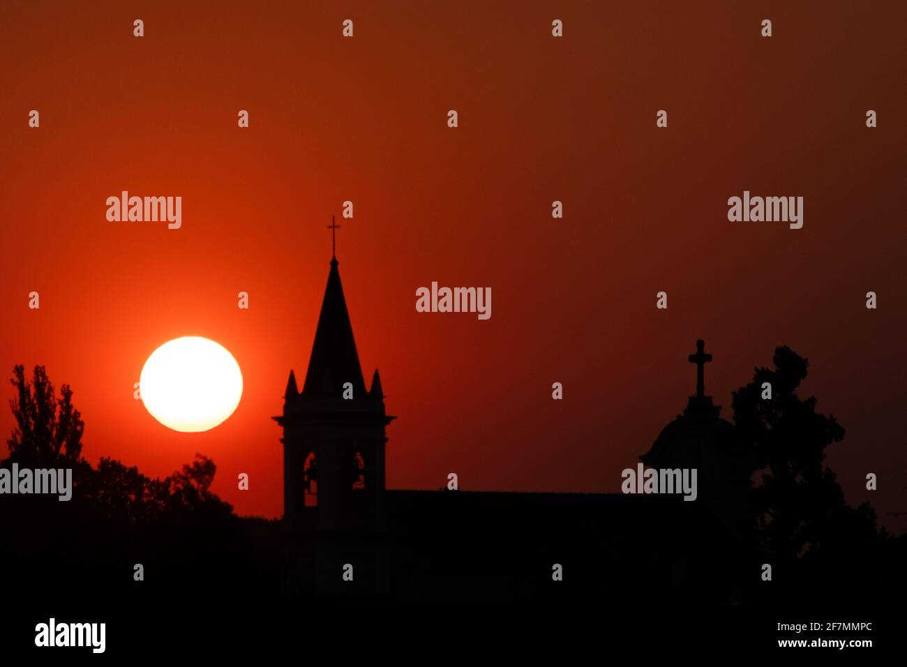 Red sunset at italian church in emilia romagna Stock Photo - Alamy