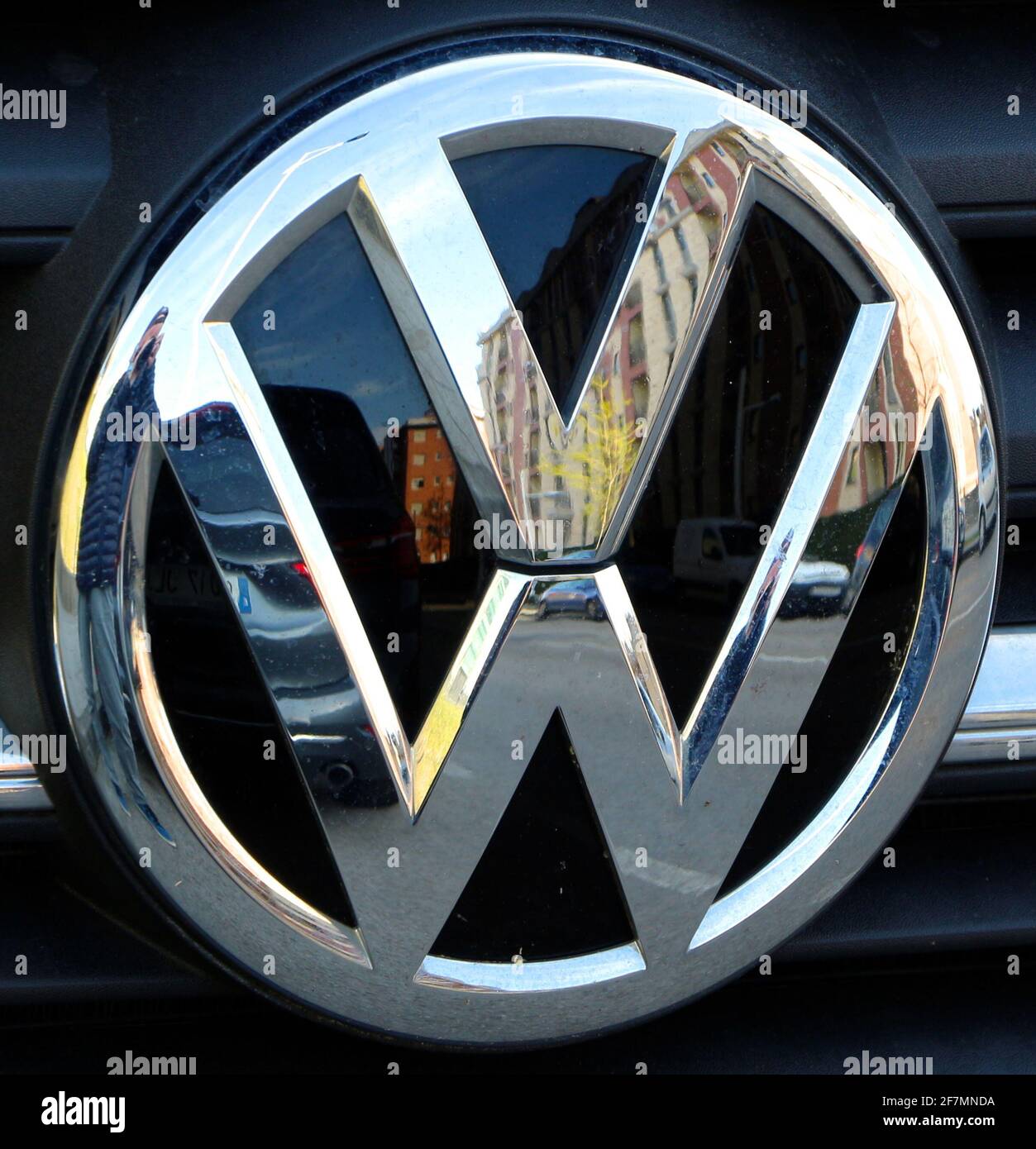Volkswagen chrome front grill car badge in natural sunlight Stock Photo ...