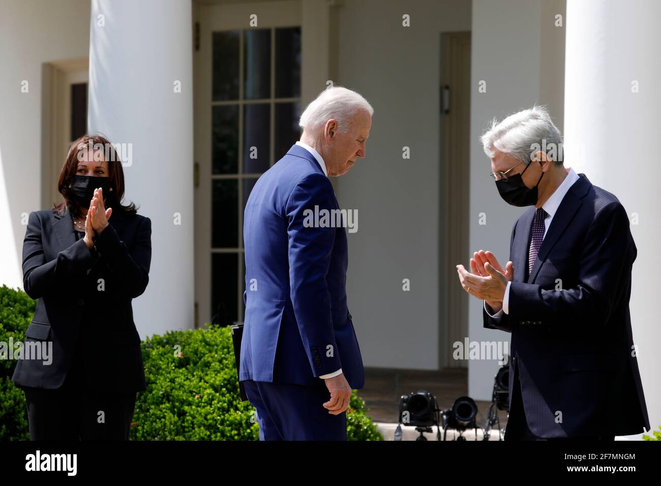 U.S. President Joe Biden is greeted by Vice President Kamala Harris and ...