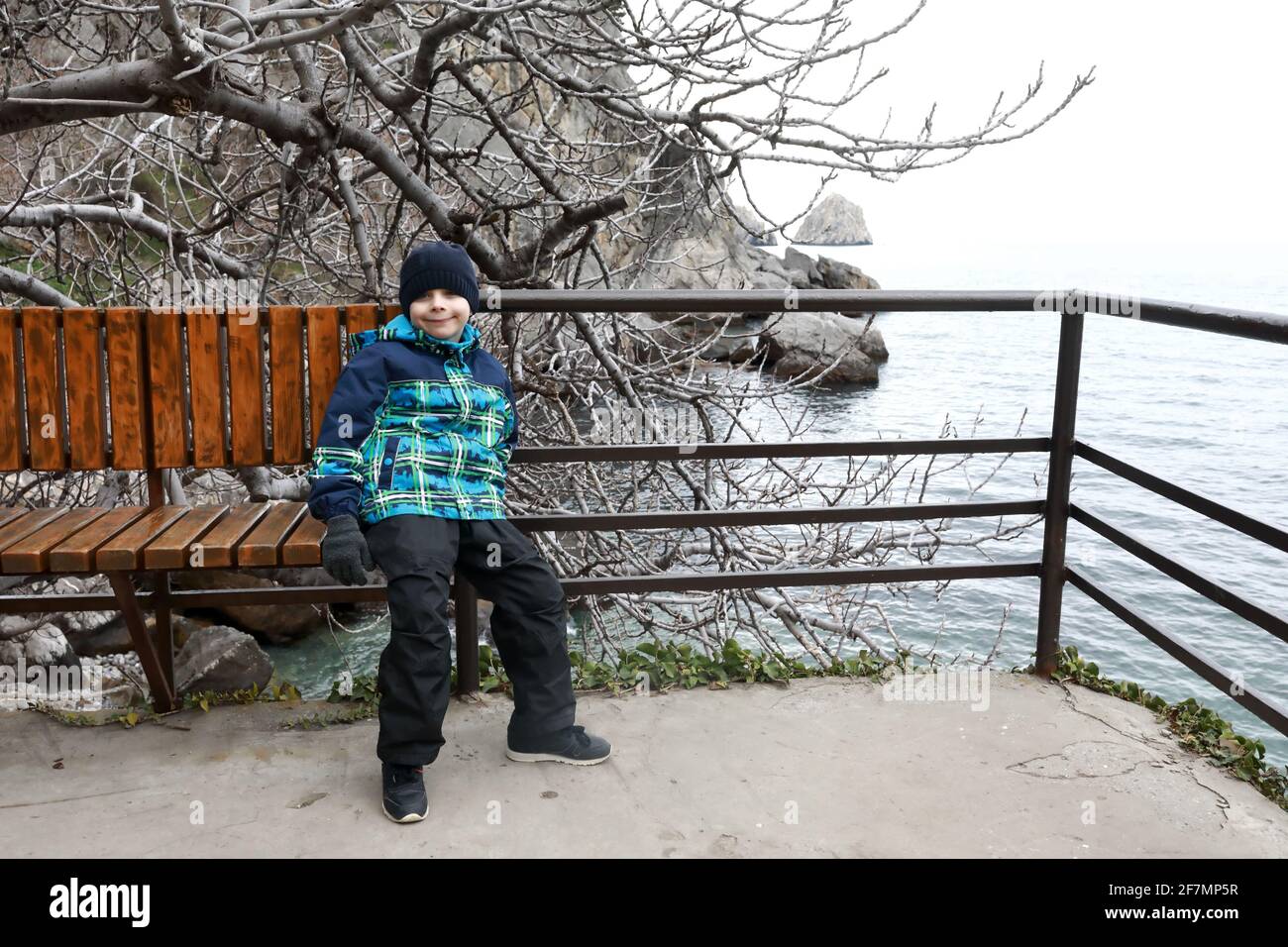 Child on a bench at Chekhov's dacha, Gurzuf, Crimea Stock Photo - Alamy