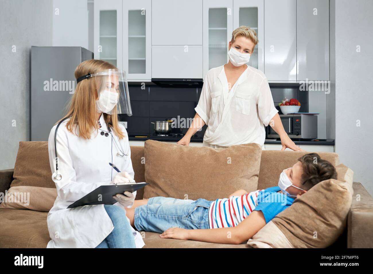 Sick children parent hi-res stock photography and images - Alamy