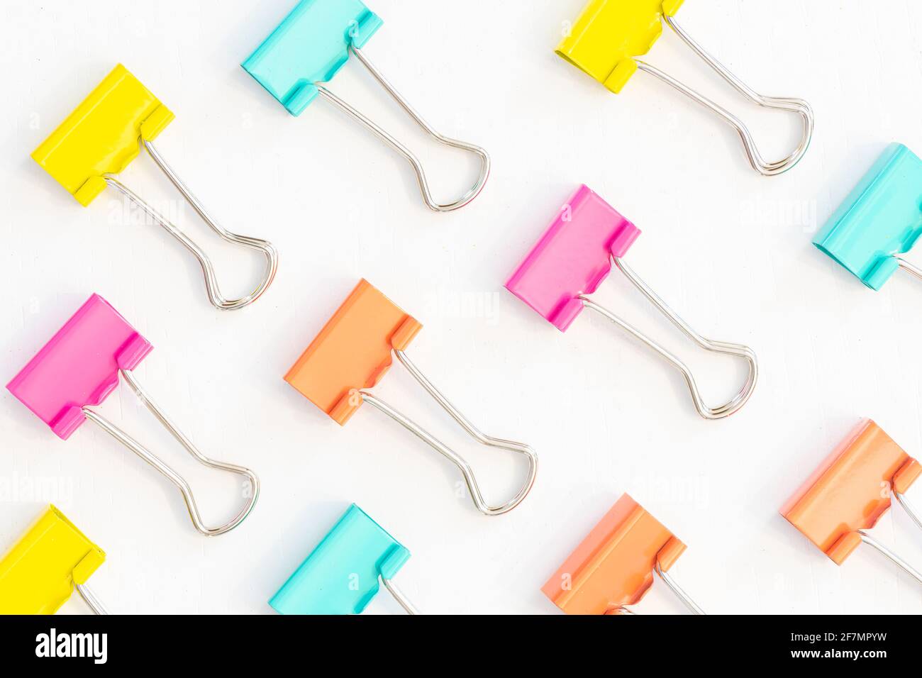 Multicolored binder clips isolated on white background Stock Photo - Alamy