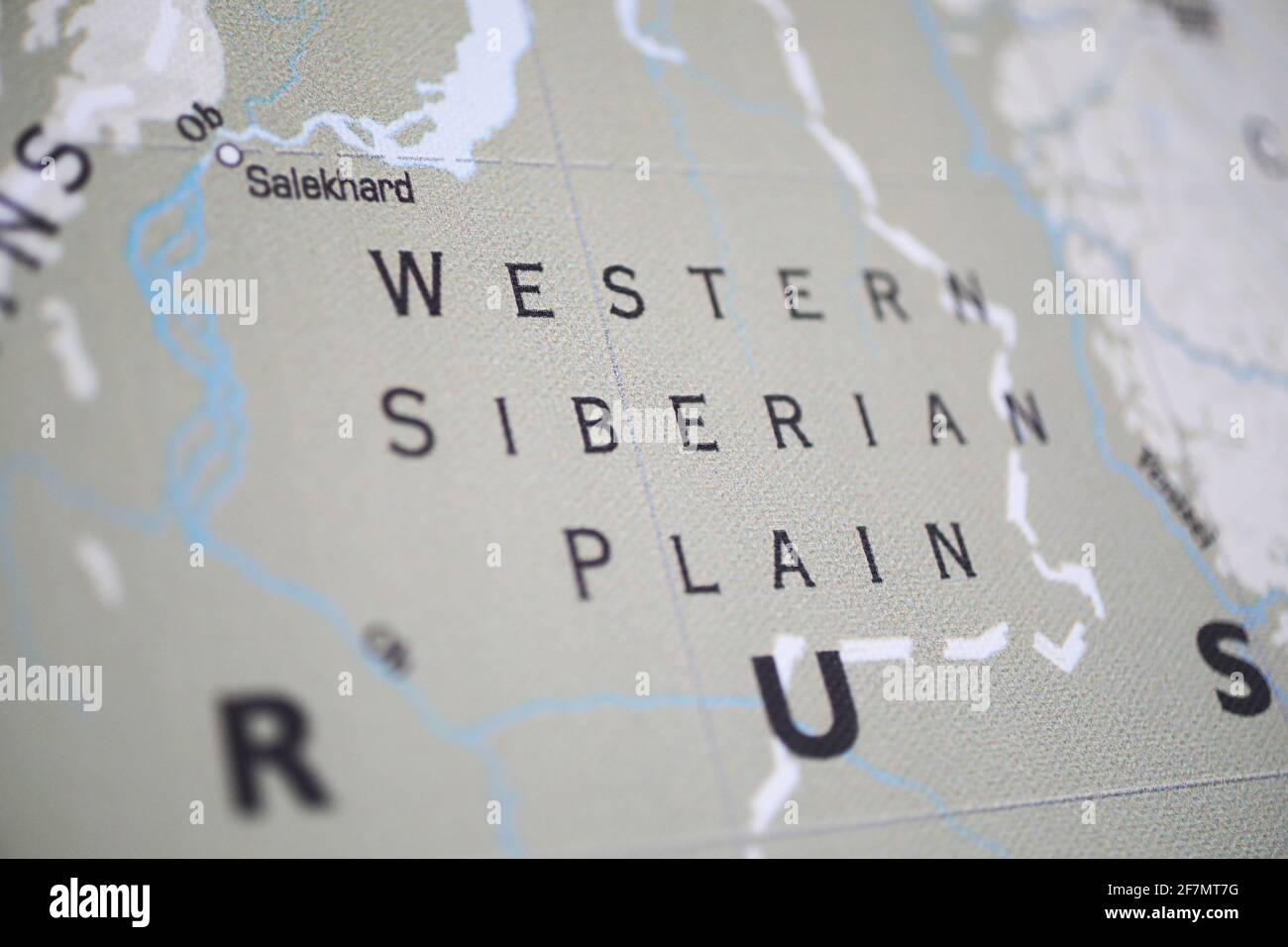 Western Siberian plain, Russia, on a world map at home in a living room ...