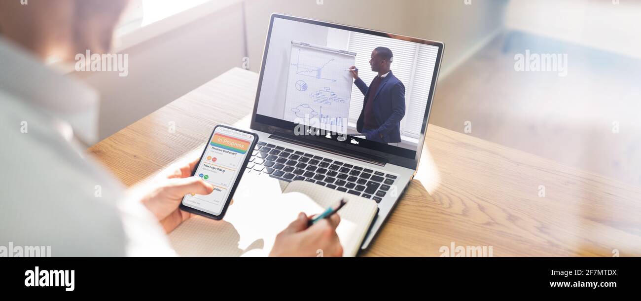 Virtual Online Training Program With Coach On Laptop Stock Photo - Alamy