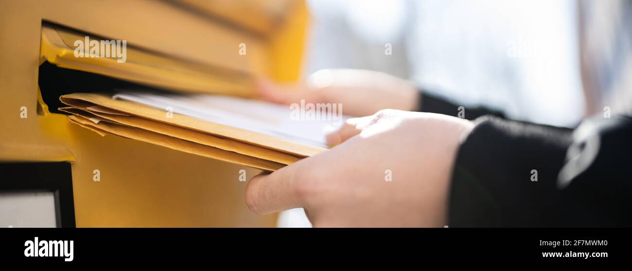Letter In Envelope Or Document In Mailbox. Man Hand Sending Mail Stock ...