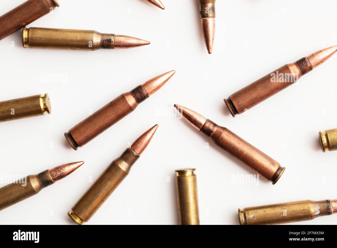 A group of bullet ammunition shells on a white background Stock Photo ...